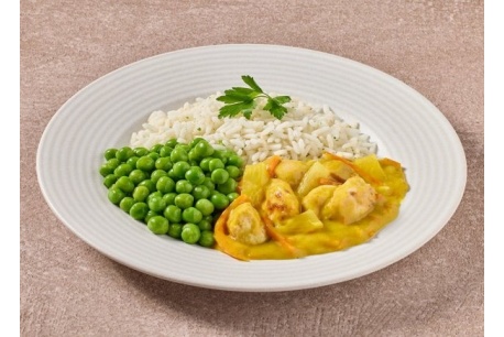 Kip in kerriesaus met doperwten en rijst